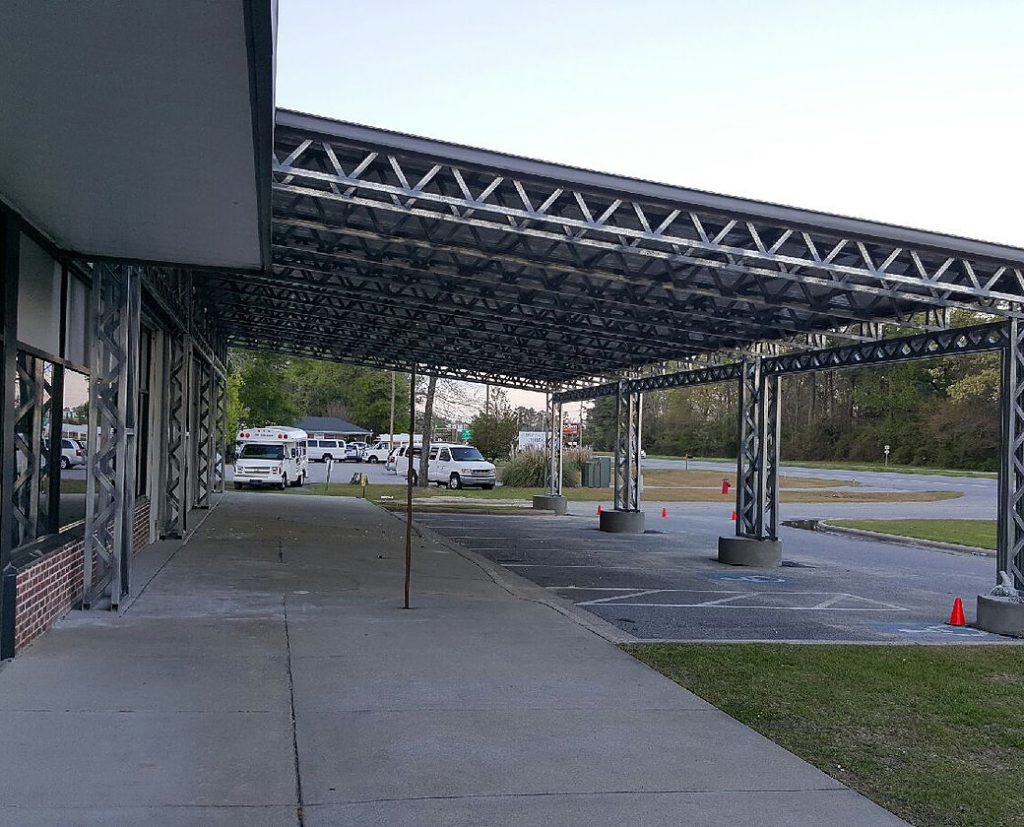 #125 Large Lean-to On Existing Structure | Elite Metal Structures
